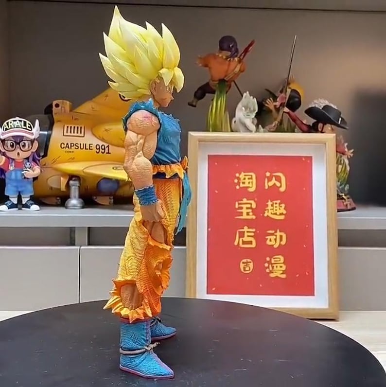 Super Saiyan Goku Battle-damaged Figure – Ultimate Warrior Edition ...