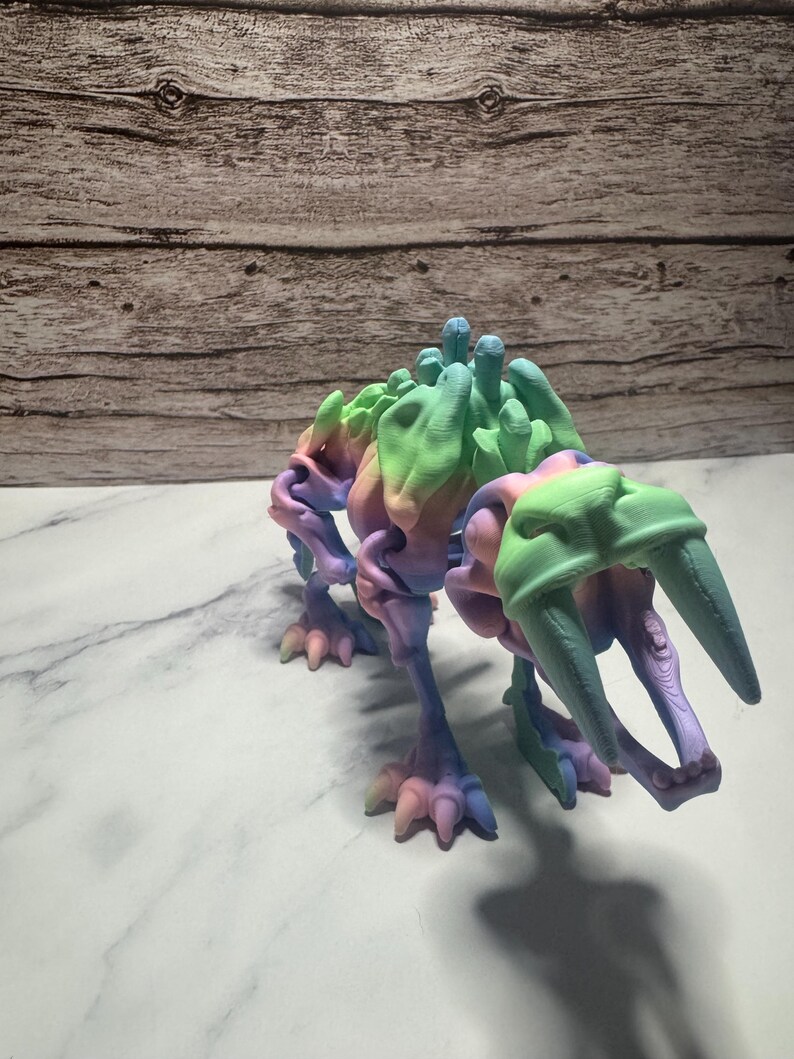Articulated 3D Printed Saber-toothed Tiger Skeleton: Rainbow Flexi ...