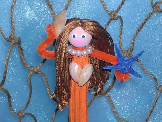 Items similar to Under the sea Mermaid doll figurine with starfish and ...
