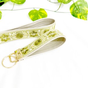 Elegant Embroidered Keychain Wristlet With Sequin Accent, Faux Leather ...