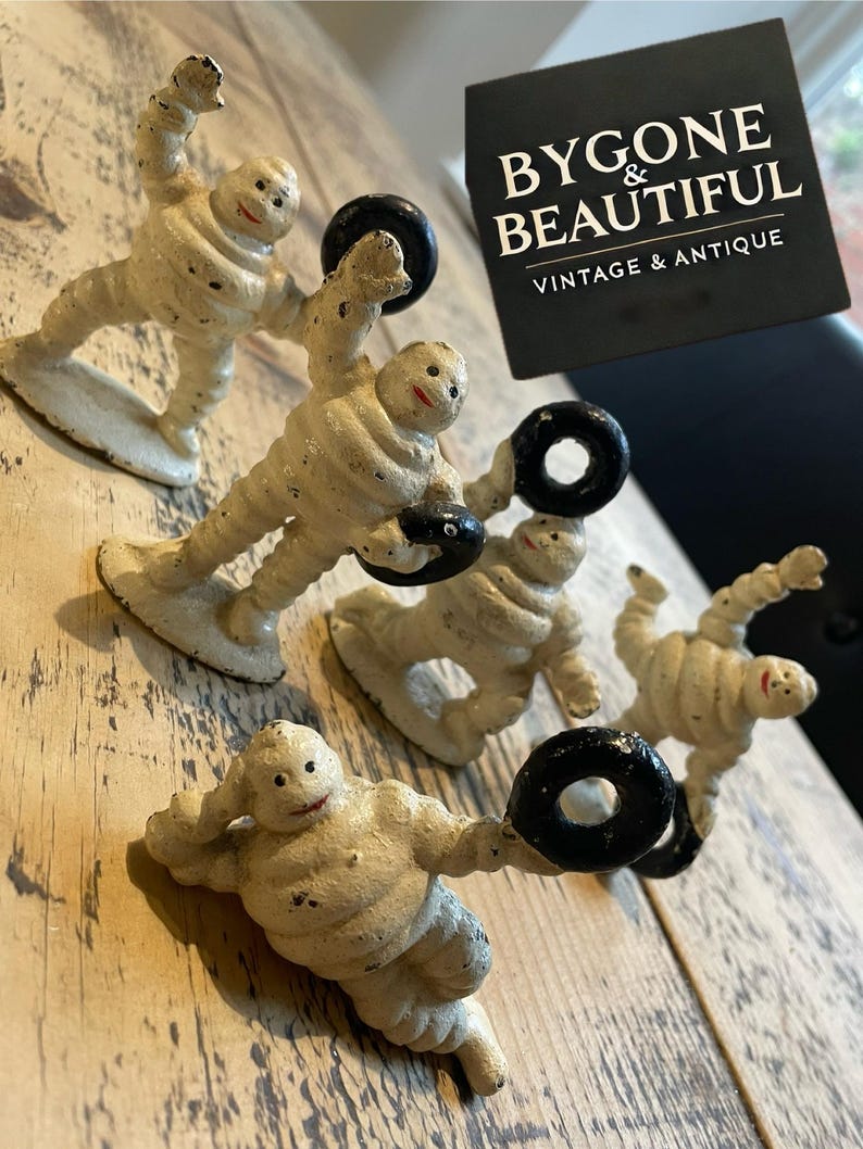 Set of 5 Vintage Cast Iron Michelin Man Figures – Bibendum Tyre Mascots ...