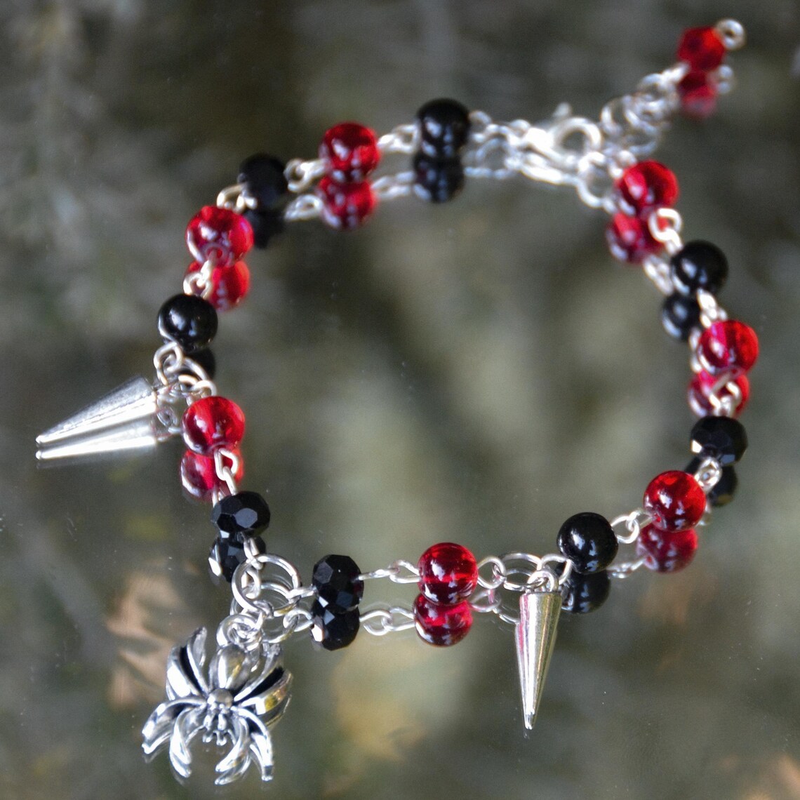 Red Recluse | Spider Goth Beaded Bracelet Red Black Spikes Silver ...