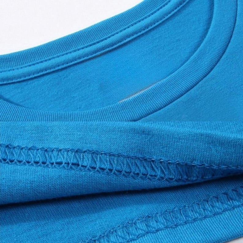 WWWE Rhea Ripley Kicking Portrait Girls T-shirt – Vintage Graphic ...