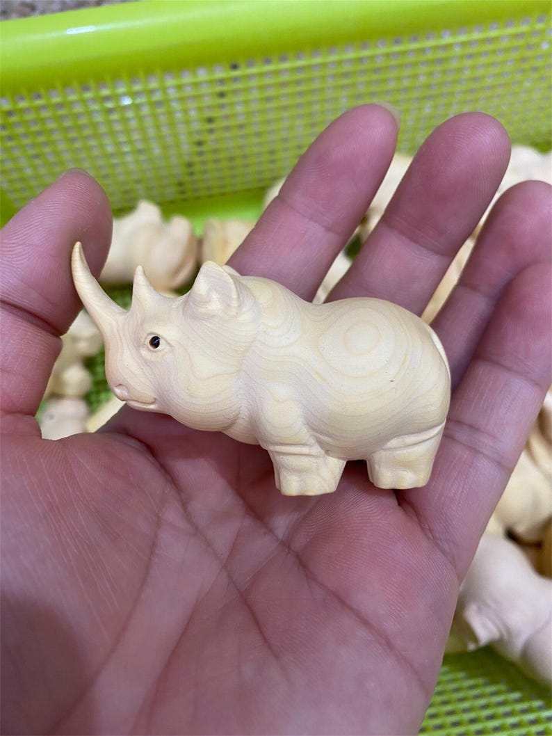 Enchanting Hand - Carved Wooden Animal Models: Exquisitely Crafted by ...