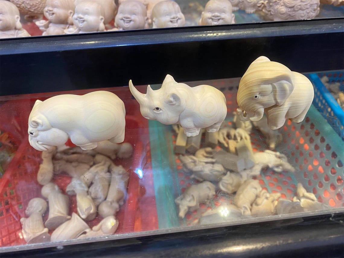 Enchanting Hand - Carved Wooden Animal Models: Exquisitely Crafted by ...