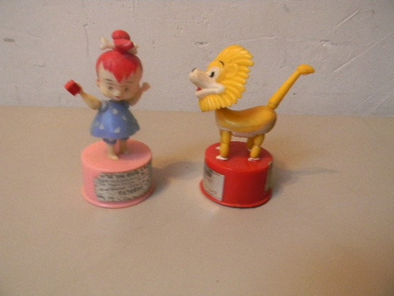 Two vintage push button puppets Pebbles and Lucky the lion | Etsy