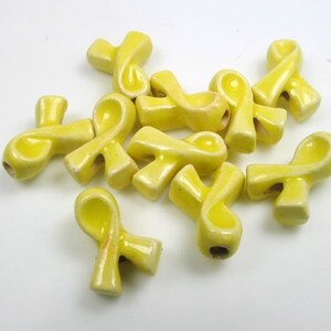 20 Tiny Yellow Ribbon Beads CB488 - Etsy