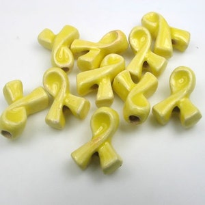 20 Tiny Yellow Ribbon Beads CB488 - Etsy