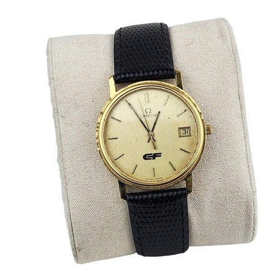 Omega Swiss Quartz Gold Plated Slim Unisex Watch - Gem