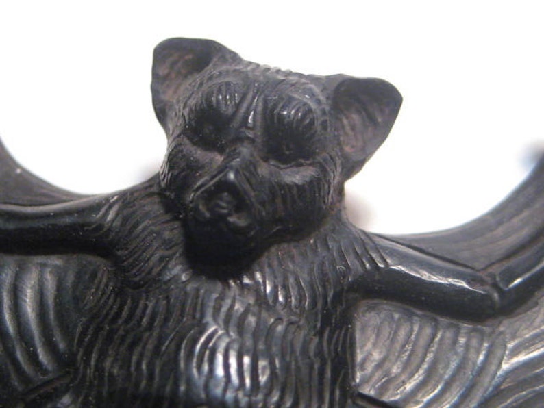 Carved Jet Bat Bead ........nicely Fully Carved .... Both Sides... 63 X ...