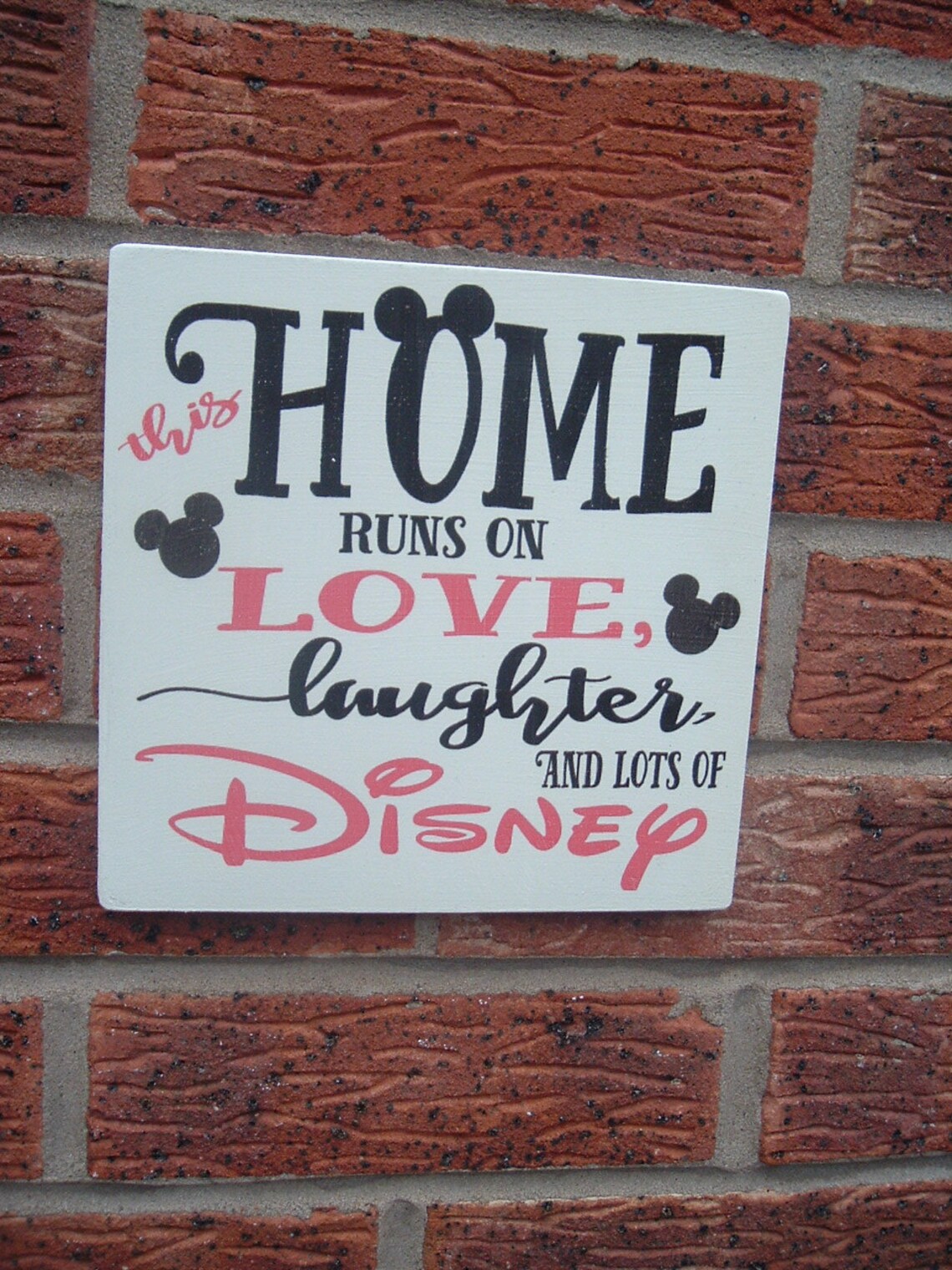 This Home Runs on Love Laughter and Disney Sign Plaque Nursery - Etsy