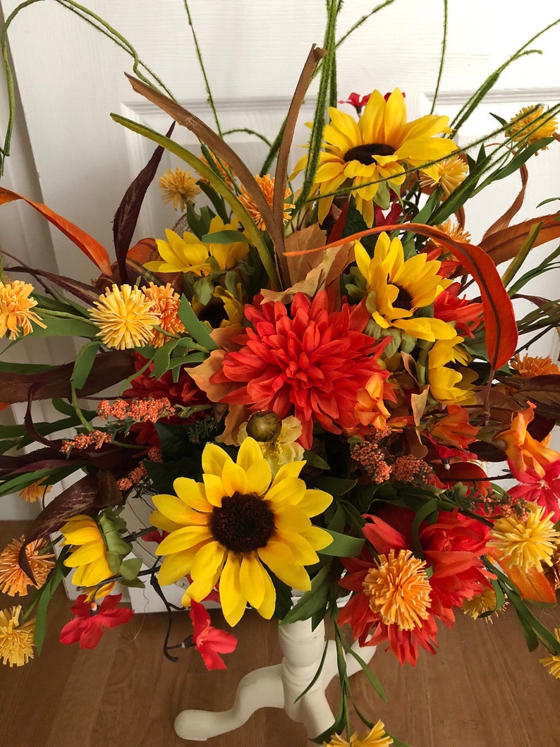 Fall Cornucopia With Sunflowers, Mums, Marigolds and a Variety of ...