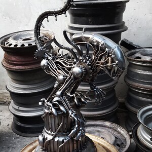 Recycled Metal Crouching Monster on Pillar / Recycle Metal Sustainable ...
