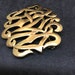 M. Jent Gold Monogram Style Brooch Intertwined Ribbon Gothic Style ...