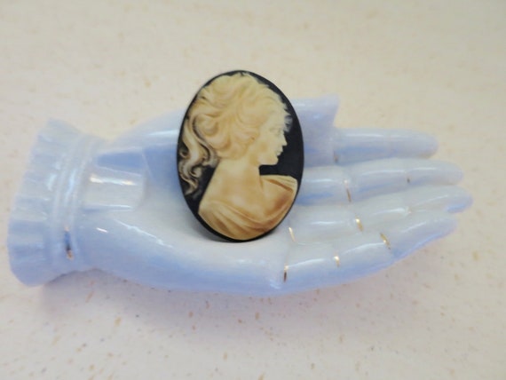 Classic Oval Cameo Brooch Black Plastic Background An… - Gem