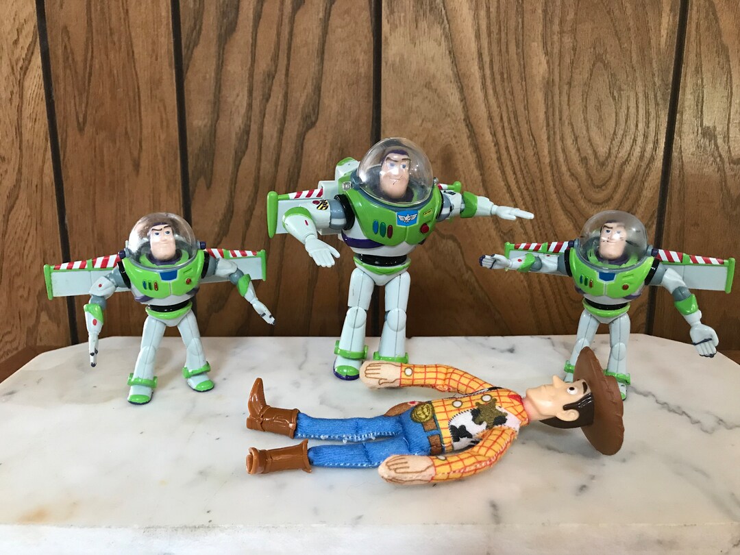 4 Toy Story Figures, 3 Buzz Lightyear, Woody Thinkway Toys Vintage ...