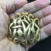 M. Jent Gold Monogram Style Brooch Intertwined Ribbon Gothic Style ...