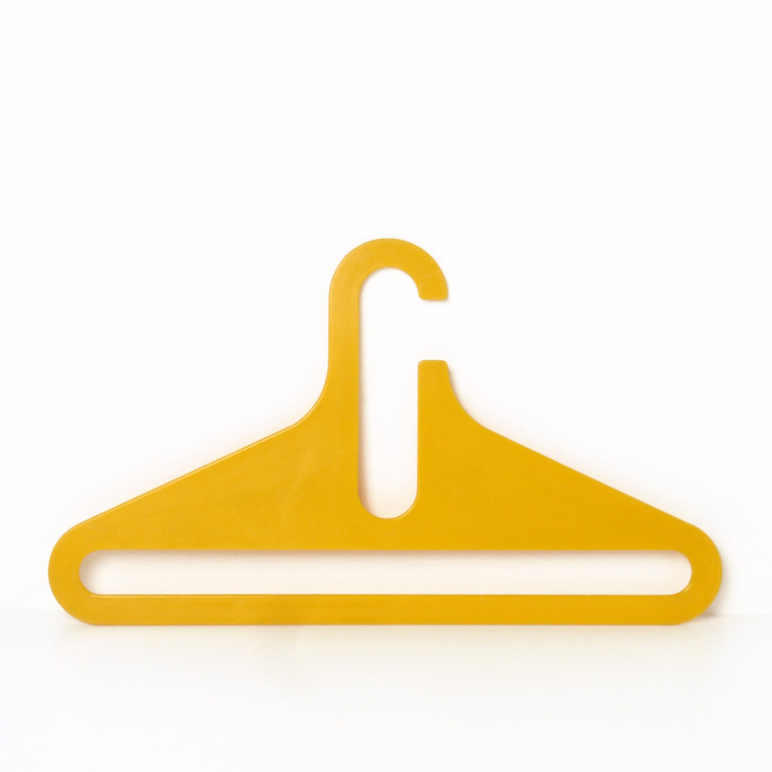 One Mid-century Modern Yellow Plastic Hanger | Etsy