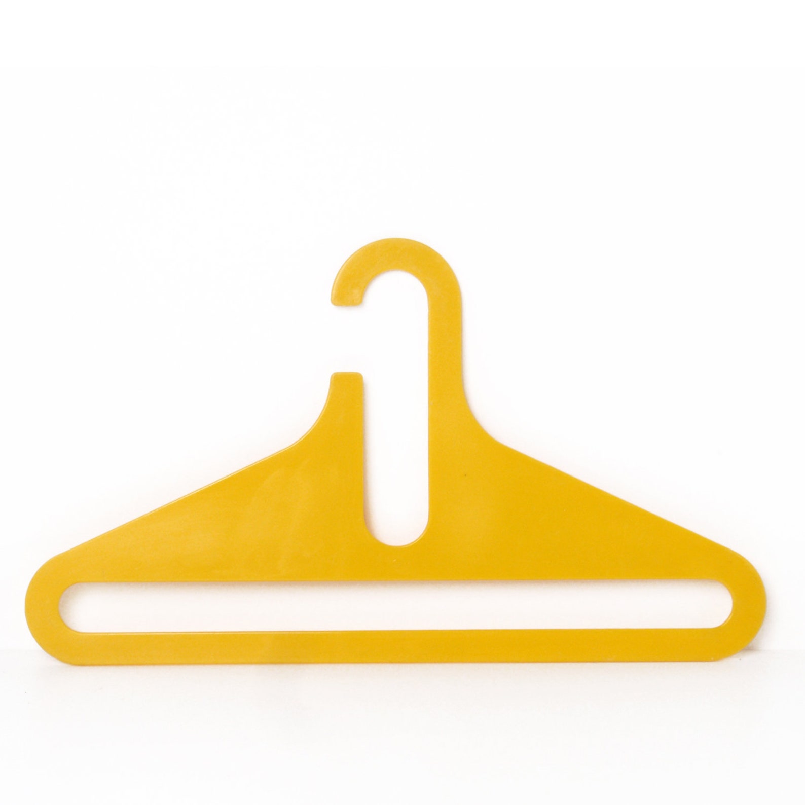 One Mid-century Modern Yellow Plastic Hanger | Etsy