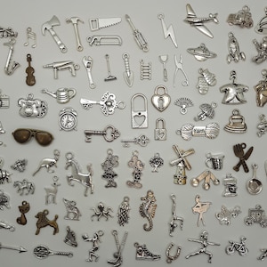 Metal Trinkets - Sets of 25, 50, or 75 - Mostly Silver - Option to ...