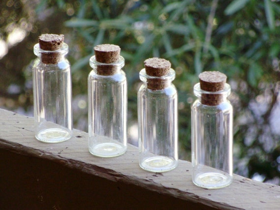 Items similar to Set of 4 Large Glass Vials With Corks- AS IS on Etsy