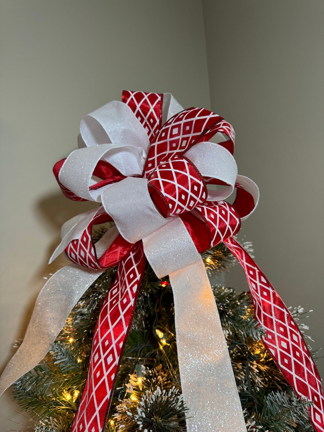 Large Red Ribbon With White Glitter Diamond Pattern and a White Glitter ...