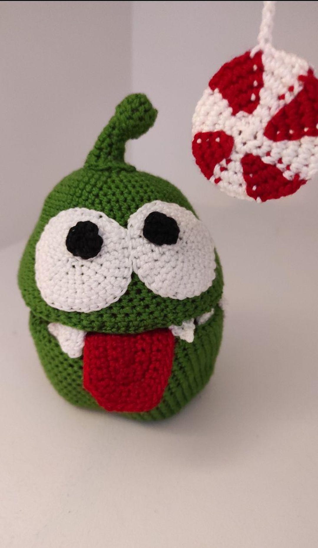 Knitted Toy Featuring a Famous Character From the Popular Game "cut the ...