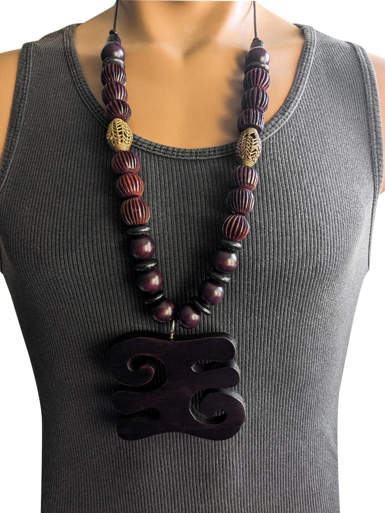 African Tribal Adinkra Symbol Pendant Necklace: Gyawu Atiko Wood Symbol ...