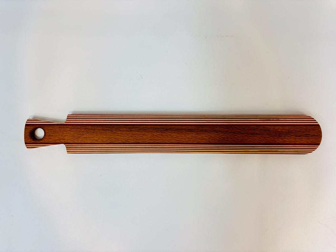 A Cheeky Little Face Grain Serving Board in Lacewood, Maple, Padauk ...