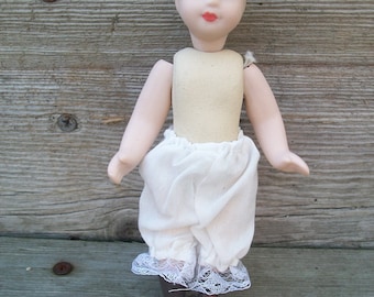 Small porcelain doll | Etsy