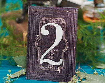 Table number book | Etsy