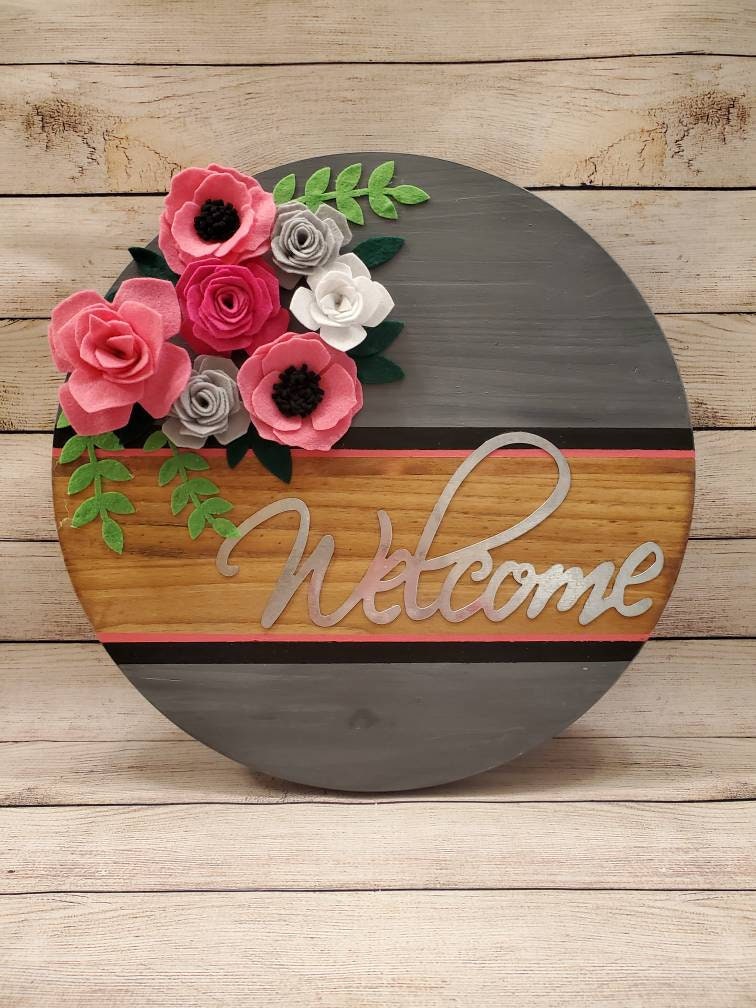 18 in. Round Wood Sign w/ Felt Flowers and the word Welcome in metal ...