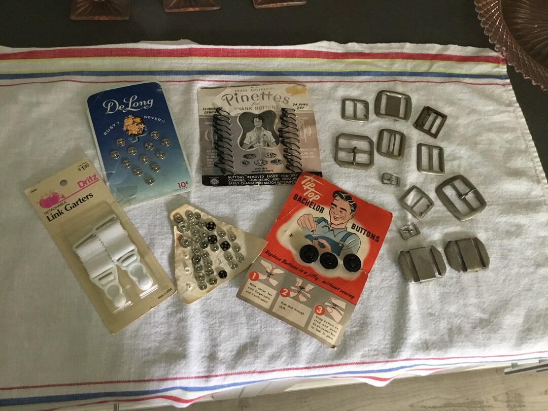 Mixed Lot of Fasteners Buckles Snaps Pins and Garters A Collection of ...