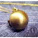 Round Gold Ball Locket Necklace - Antique Brass Round Ball Locket on a ...