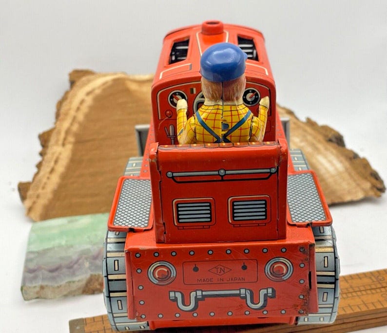 1950s Nomura Orange Piston Tractor Battery Operated Tin Toy --2369.24 ...
