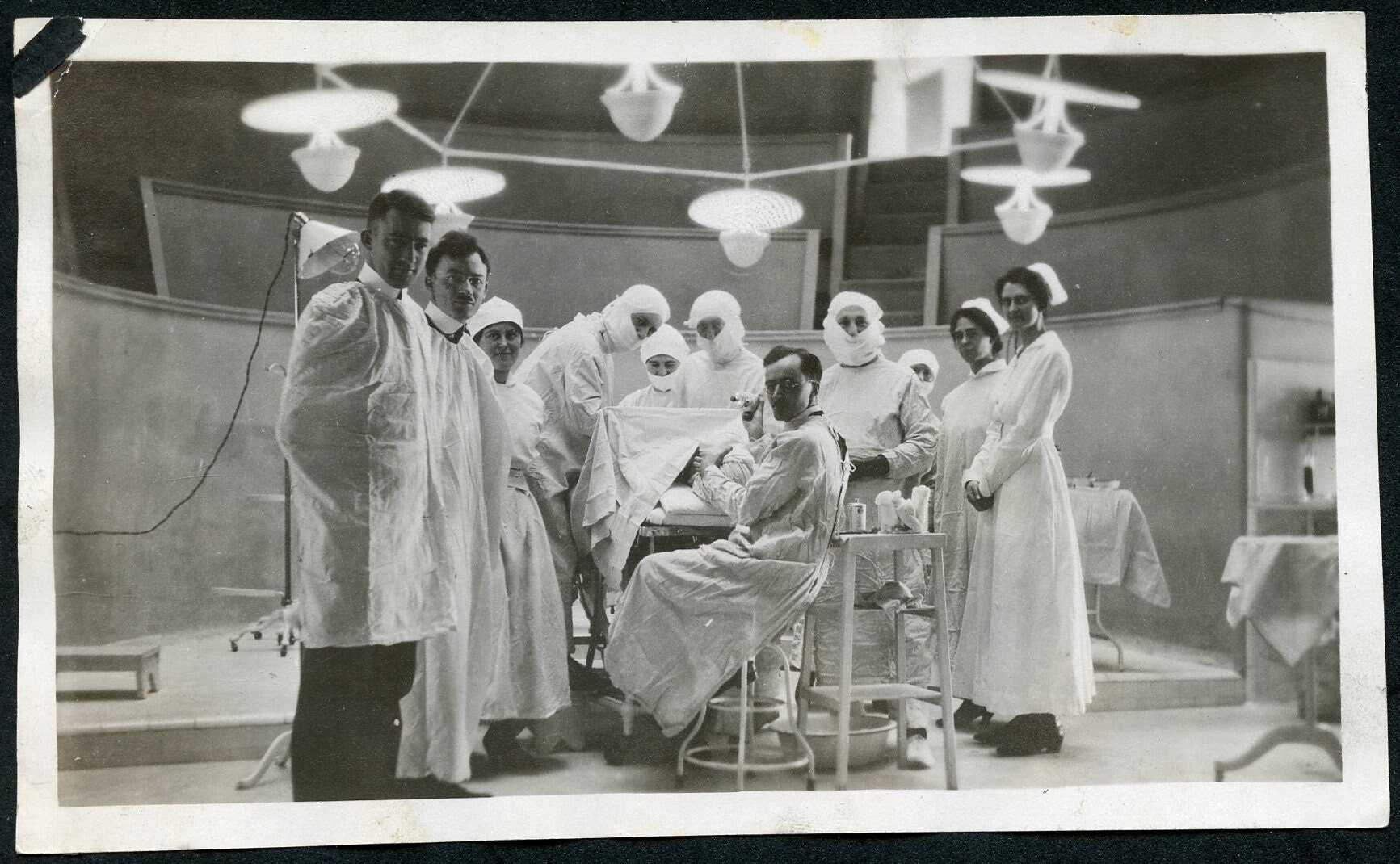 Operating Room in 1940s With DOCTORS and NURSES Working on a Patient in ...