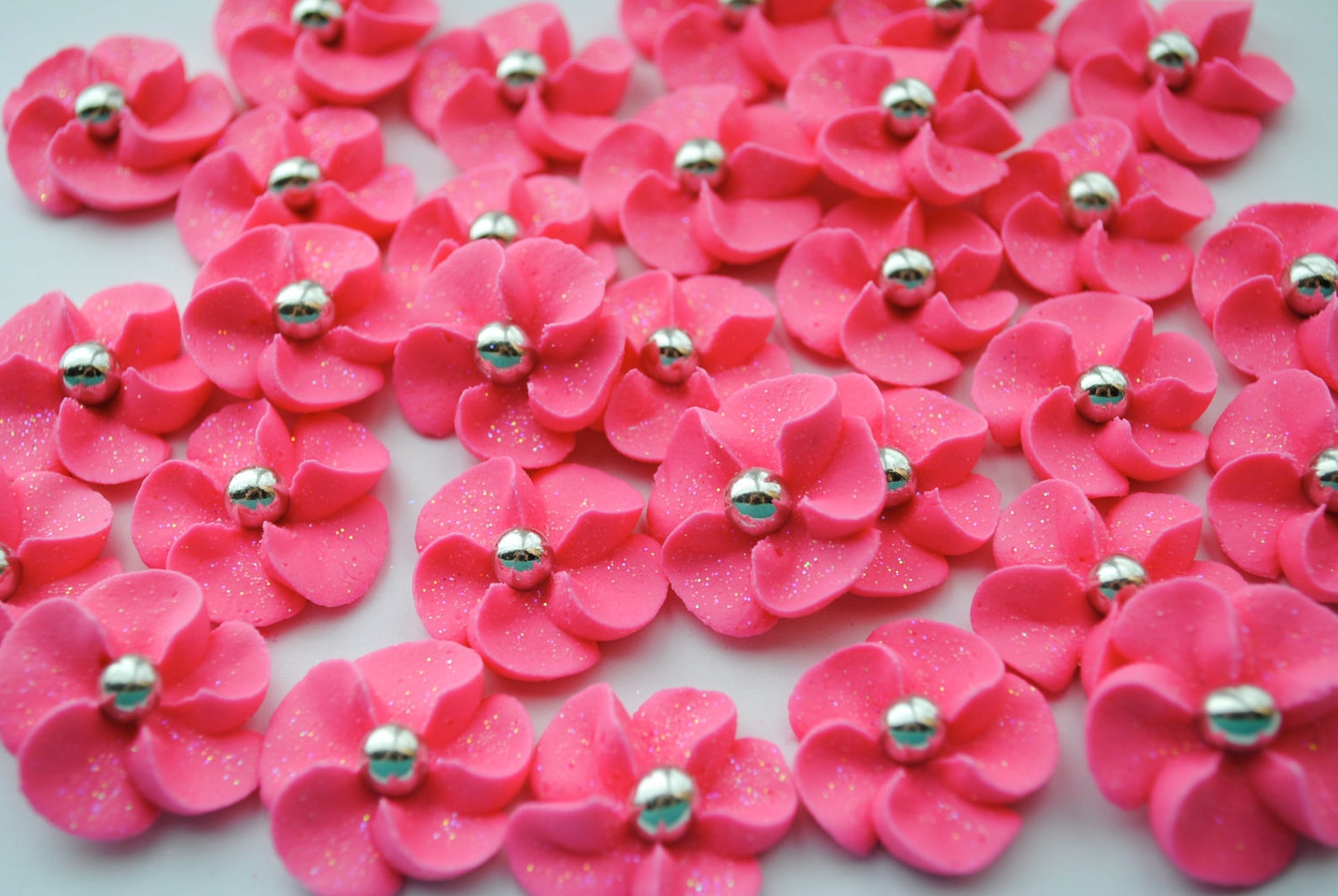 Hot Pink Royal Icing Sugar Flowers With Sparkles and a Silver Dragee ...