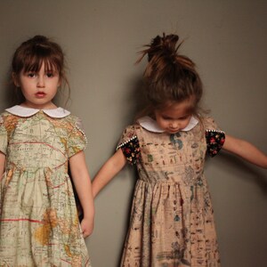 Girl's World Map Cotton Print Dress With Petal Sleeves and White Eyelet ...