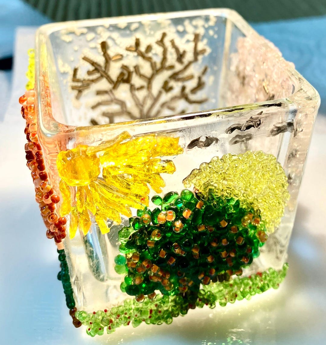 This Four-season Lantern Glows in All Colors When a Candle is Placed ...