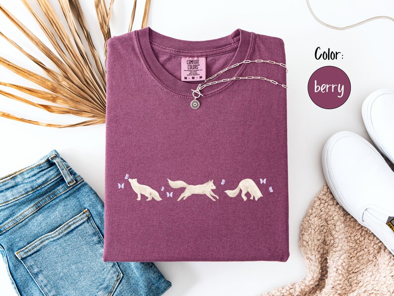 Onyx Snow Fox Quicksliver Comfort Colors® Tee, Fantasy Bookful Merch ...