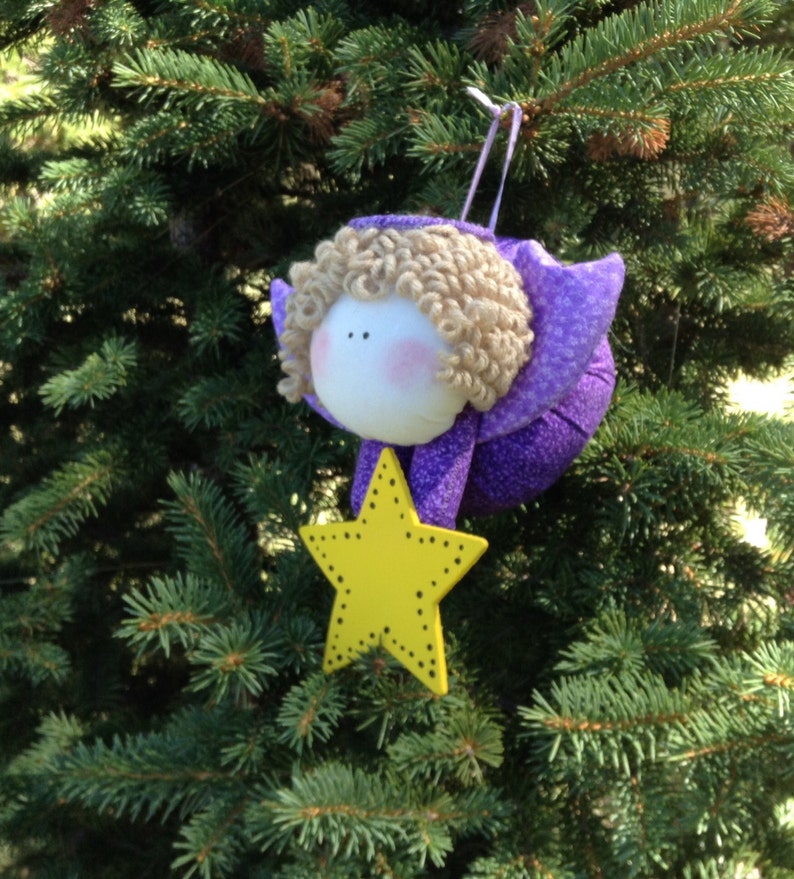 Primitive Sandy Blonde Angel With Purple Body and Purple Wings Holding ...