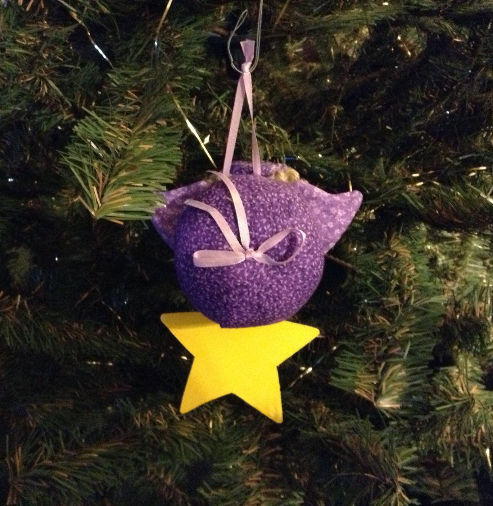 Primitive Sandy Blonde Angel With Purple Body and Purple Wings Holding ...