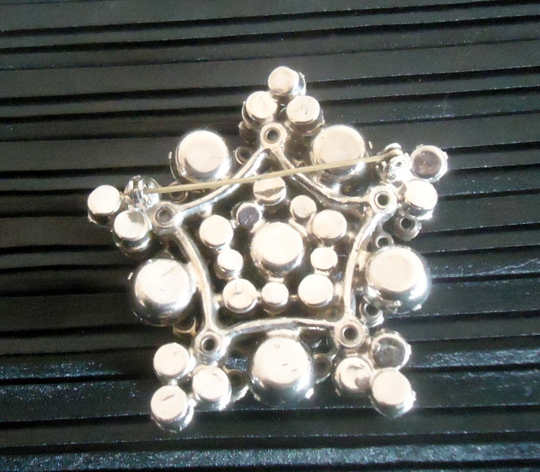 Delizza and Elster A/k/a Juliana "flower Spray" Riveted Rosette Aurora ...