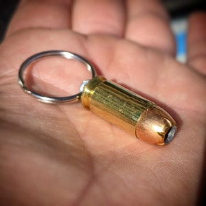 BULLET KEYCHAIN - Real .45 Caliber Hollow Point Bullet Key Chain ...