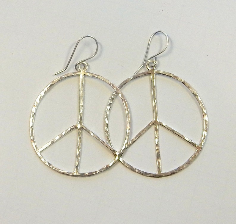 Hand forged Sterling Peace Sign Earring | Etsy