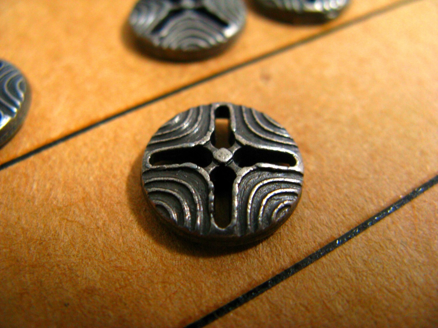 Metal Buttons - Cross Hole Gunmetal Buttons.with Bump Stripes Pattern ...