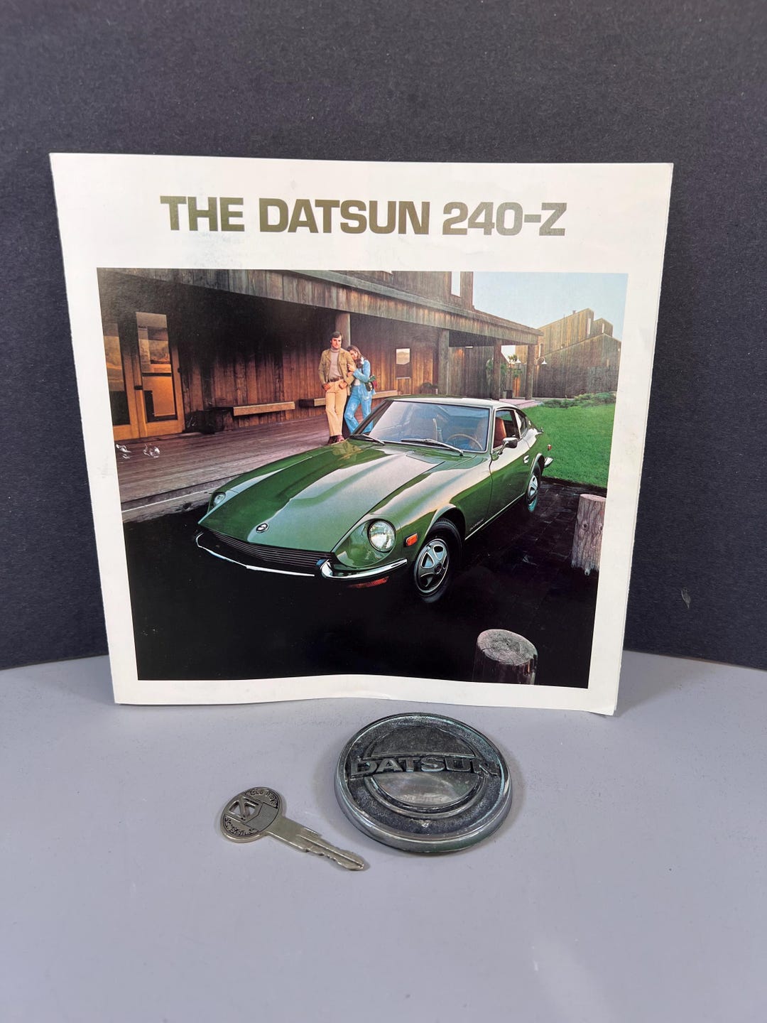 1972 Datsun 240Z Lot – Original Sales Brochure, Emblem & Key – Vintage ...