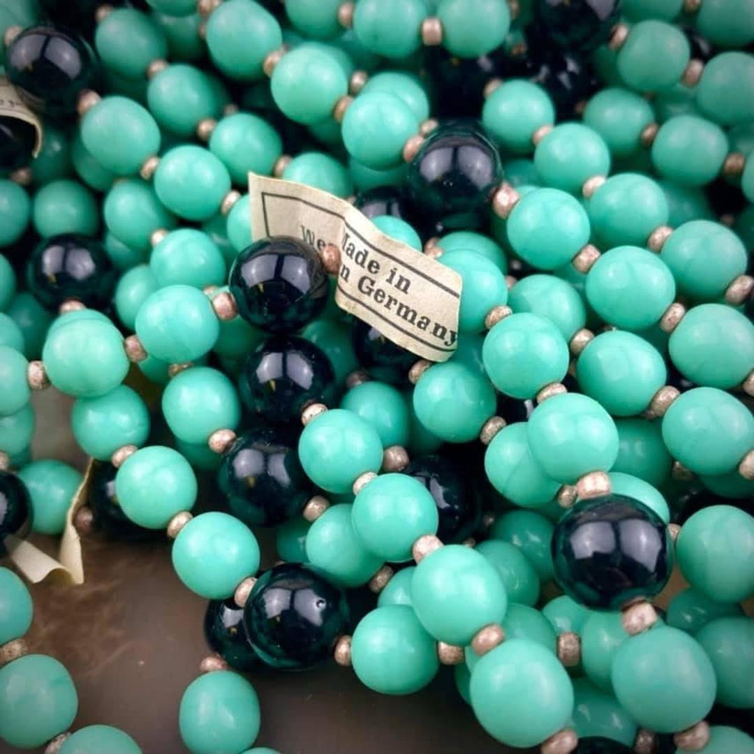 Vintage West German (U.S. Zone) Turquoise and Black Pressed Round LONG ...