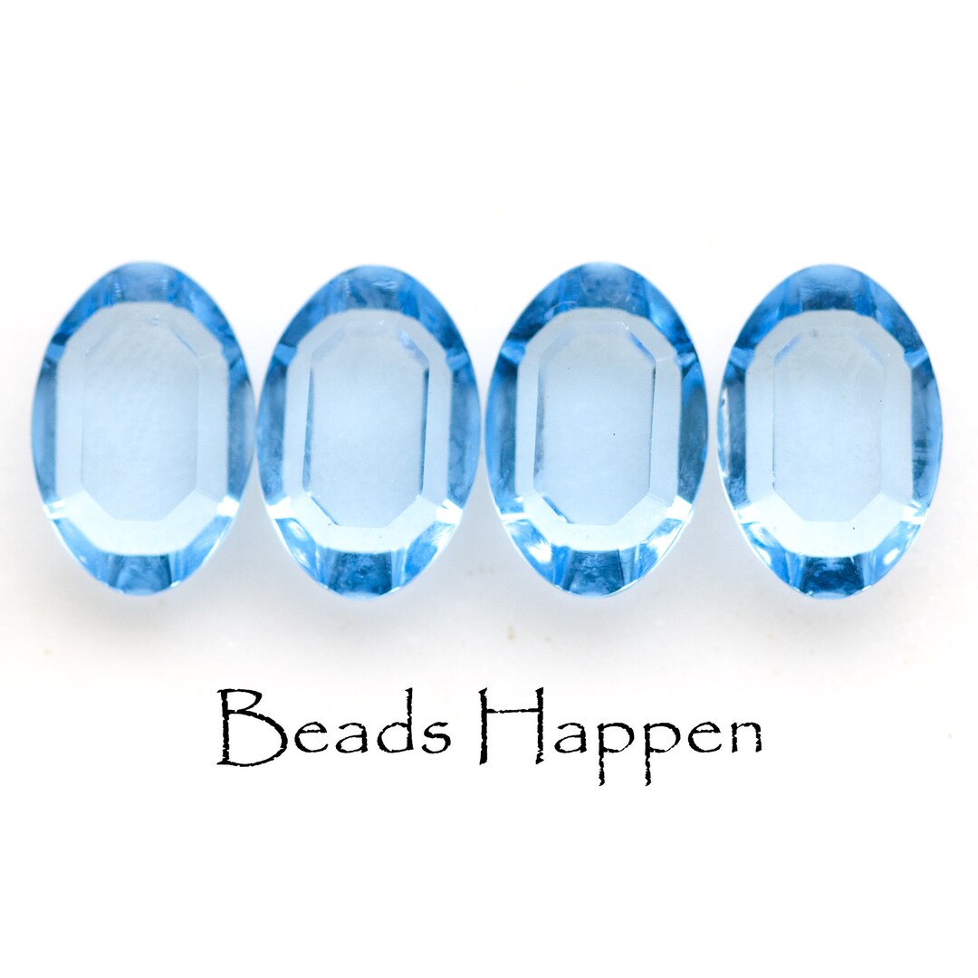 SWAROVSKI 12x8mm Oval Channel Cut Light Sapphire Blue Faceted Oval ...
