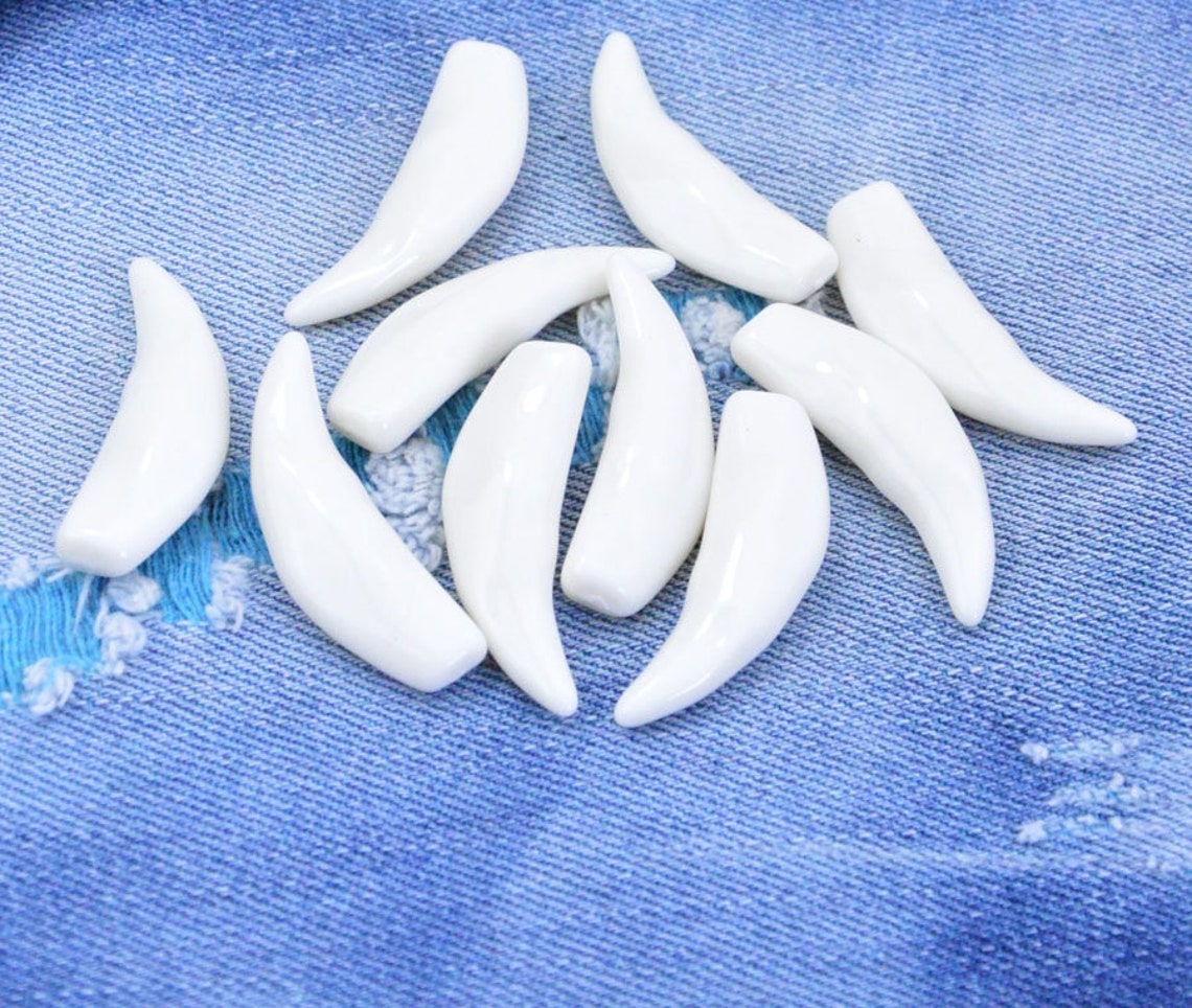 36 colmillos dientes de animales diente afilado de plástico - Etsy España